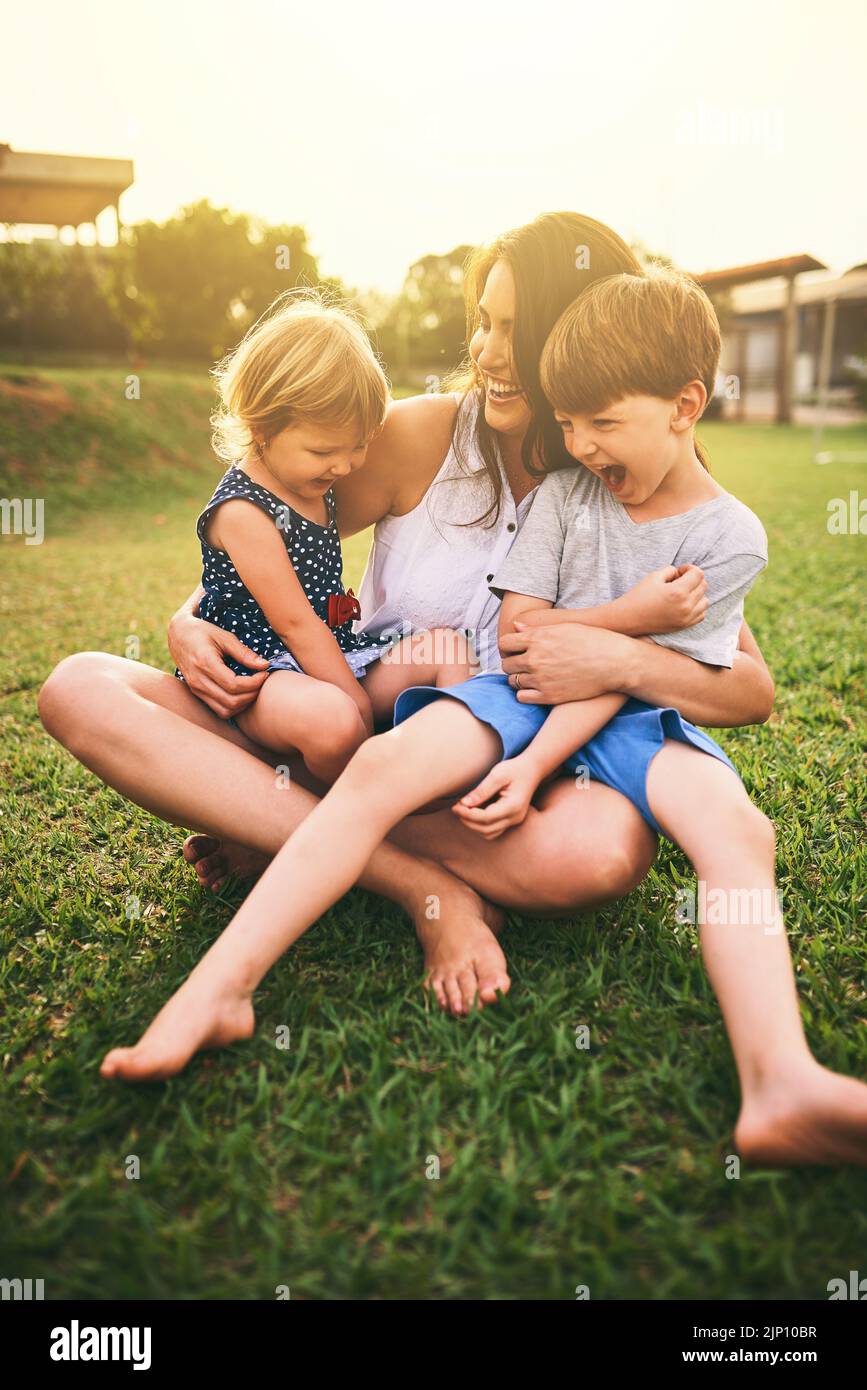 Her kids are her absolute world. a mother bonding with her two adorable ...