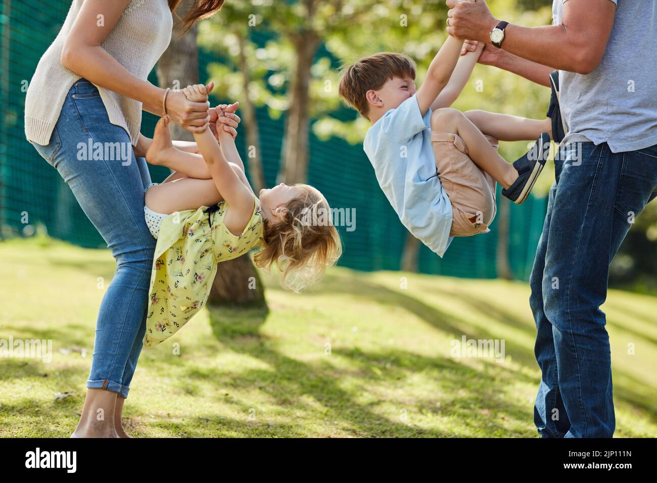 Making it a day of fun. a happy family bonding together outdoors Stock ...