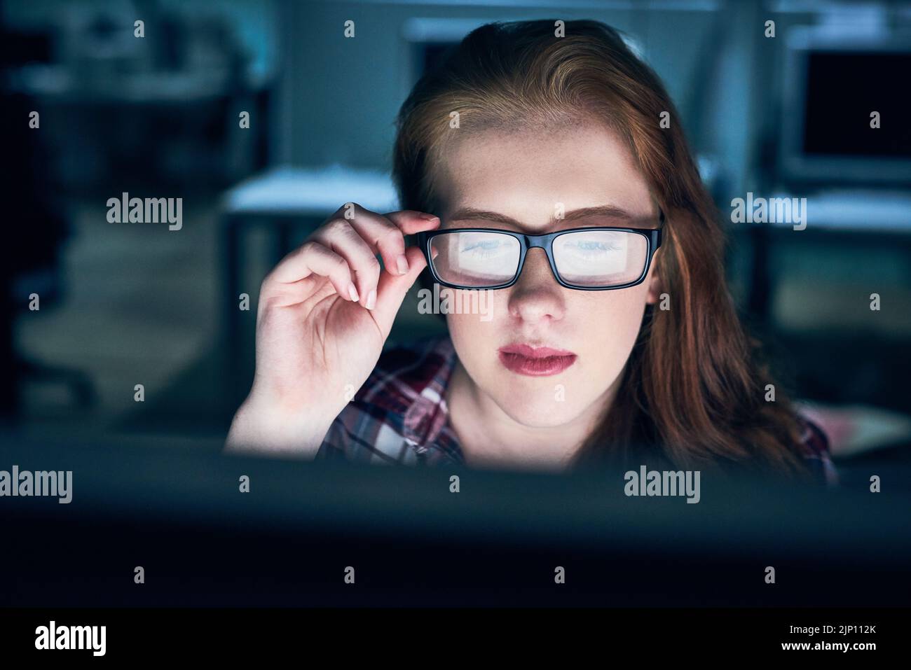 Focused young woman paying attention hi-res stock photography and ...