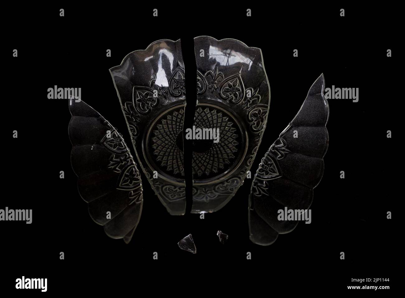 broken glass bowl with black background for concept Stock Photo - Alamy