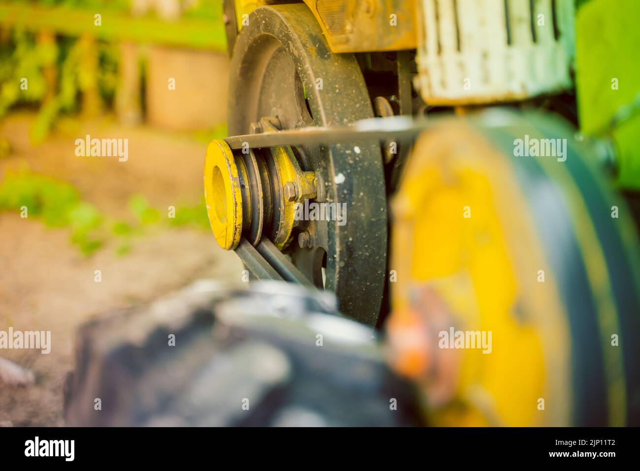 Belt drive of a garden rural motor-block. Driven two-strand pulley of a ...