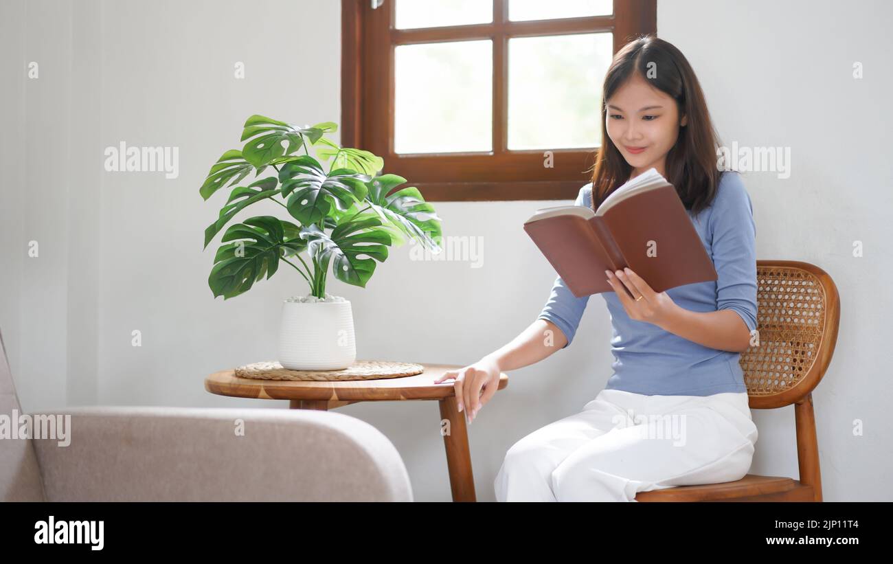 Work from home concept, Business women is sit beside the window to ...
