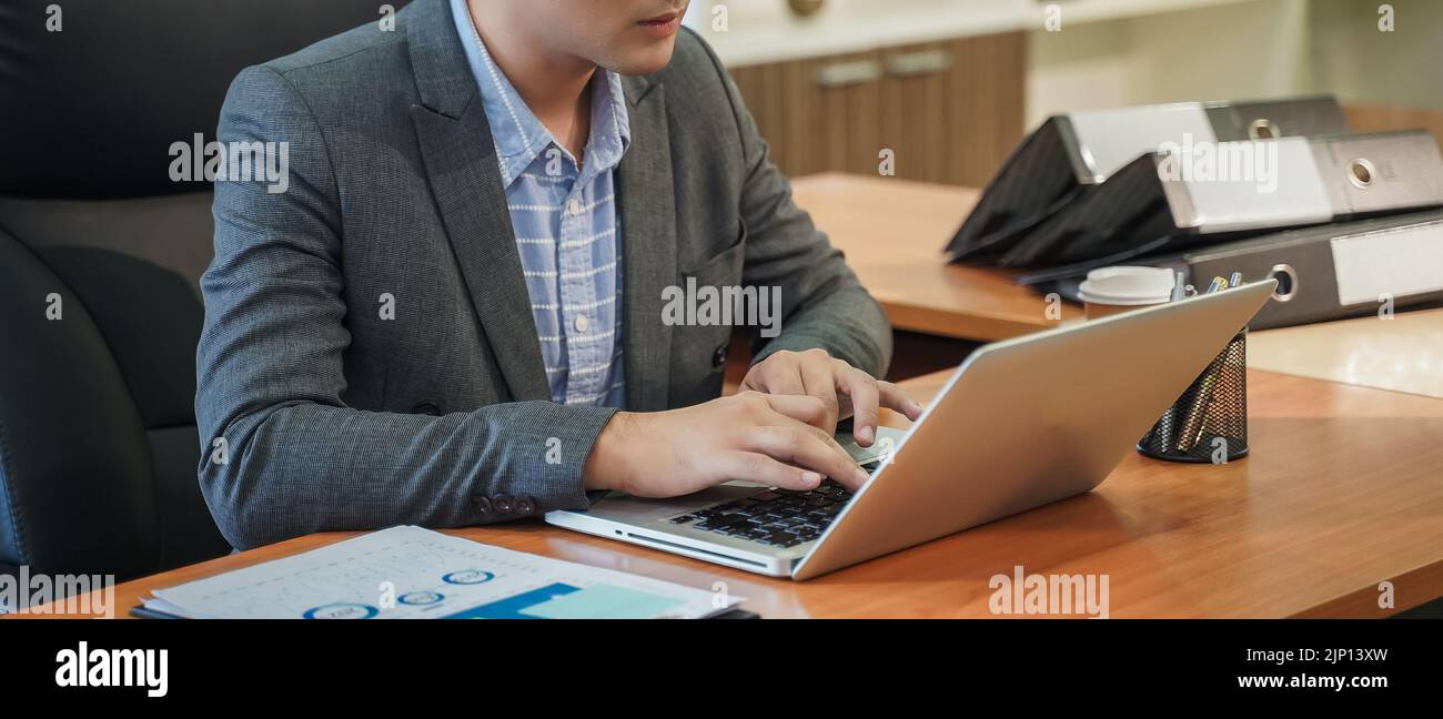Portrait businessman professional smile guy working using computer ...