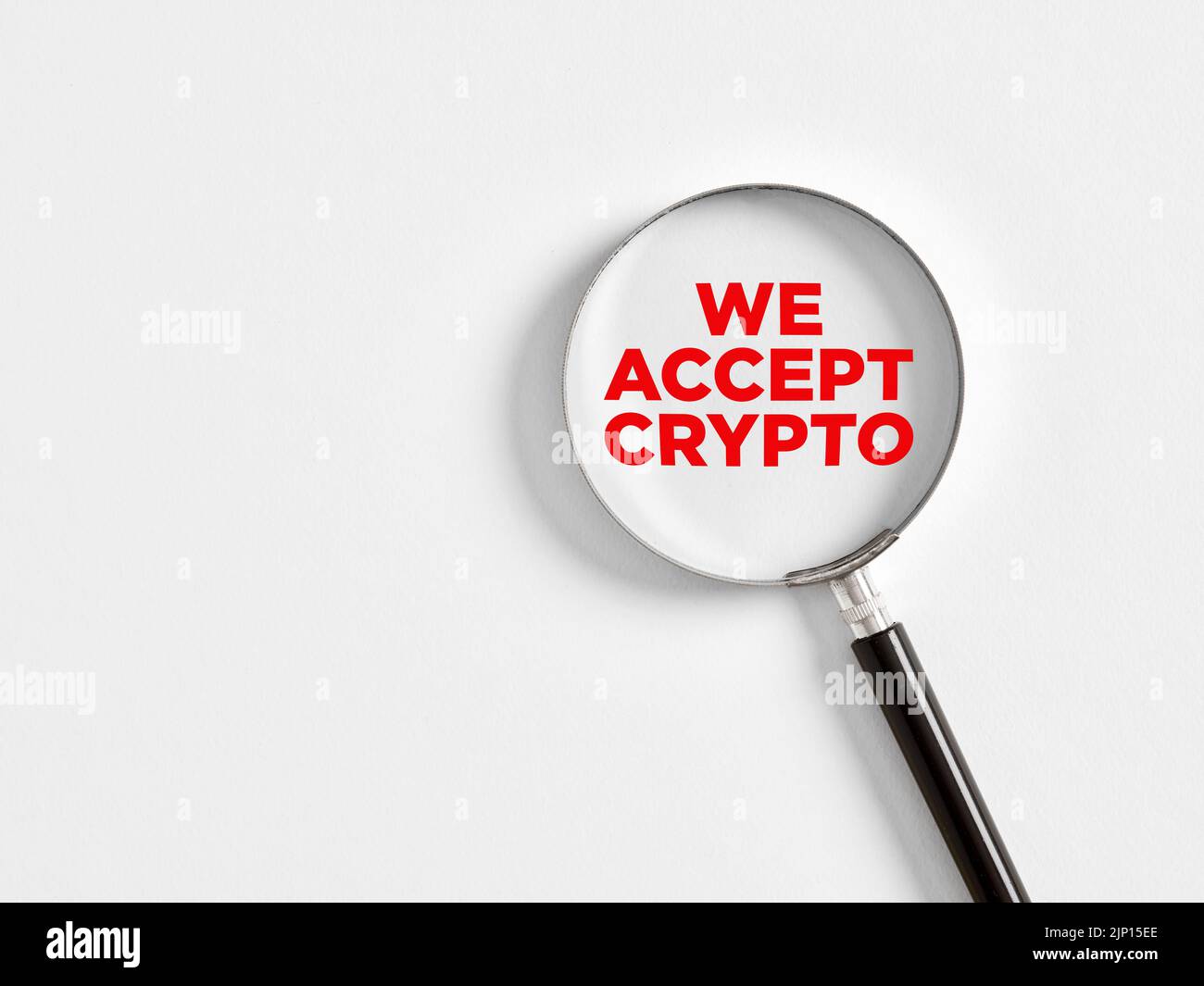 Cryptocurrency use in shopping payment concept. Magnifying glass ...