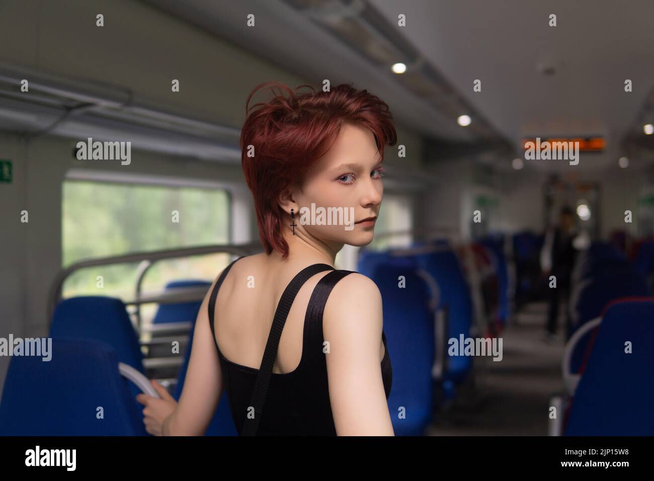 teenager girl in a commuter train car Stock Photo - Alamy