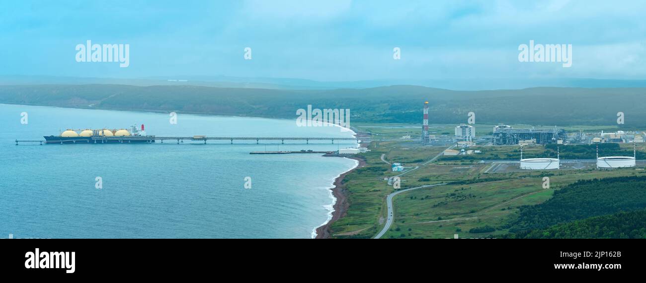 aerial view of natural gas liquefaction plant and loading terminal with ...