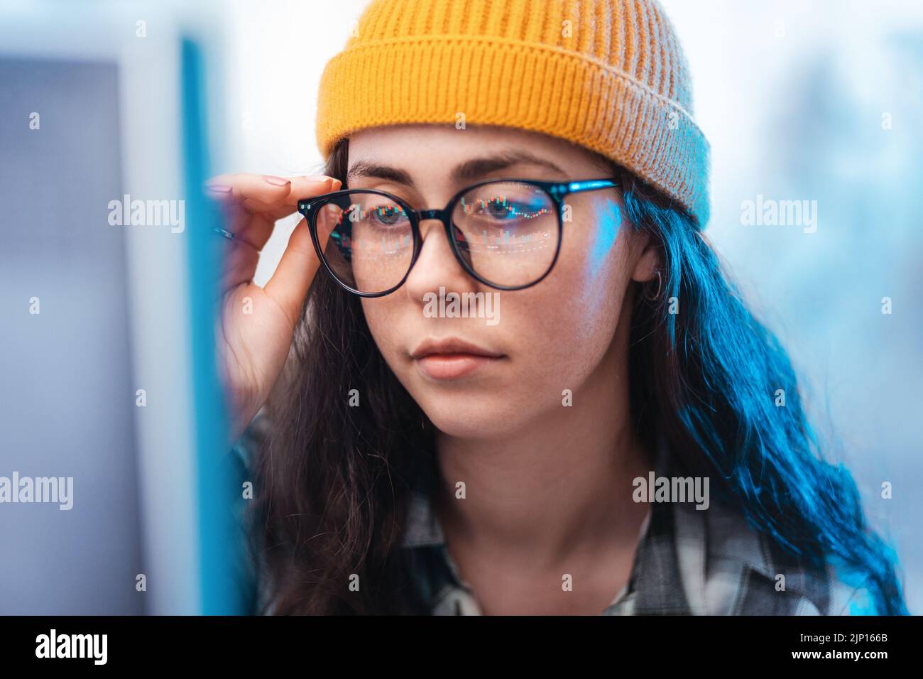 Investment, profitability and stock trading. Portrait of young trader ...