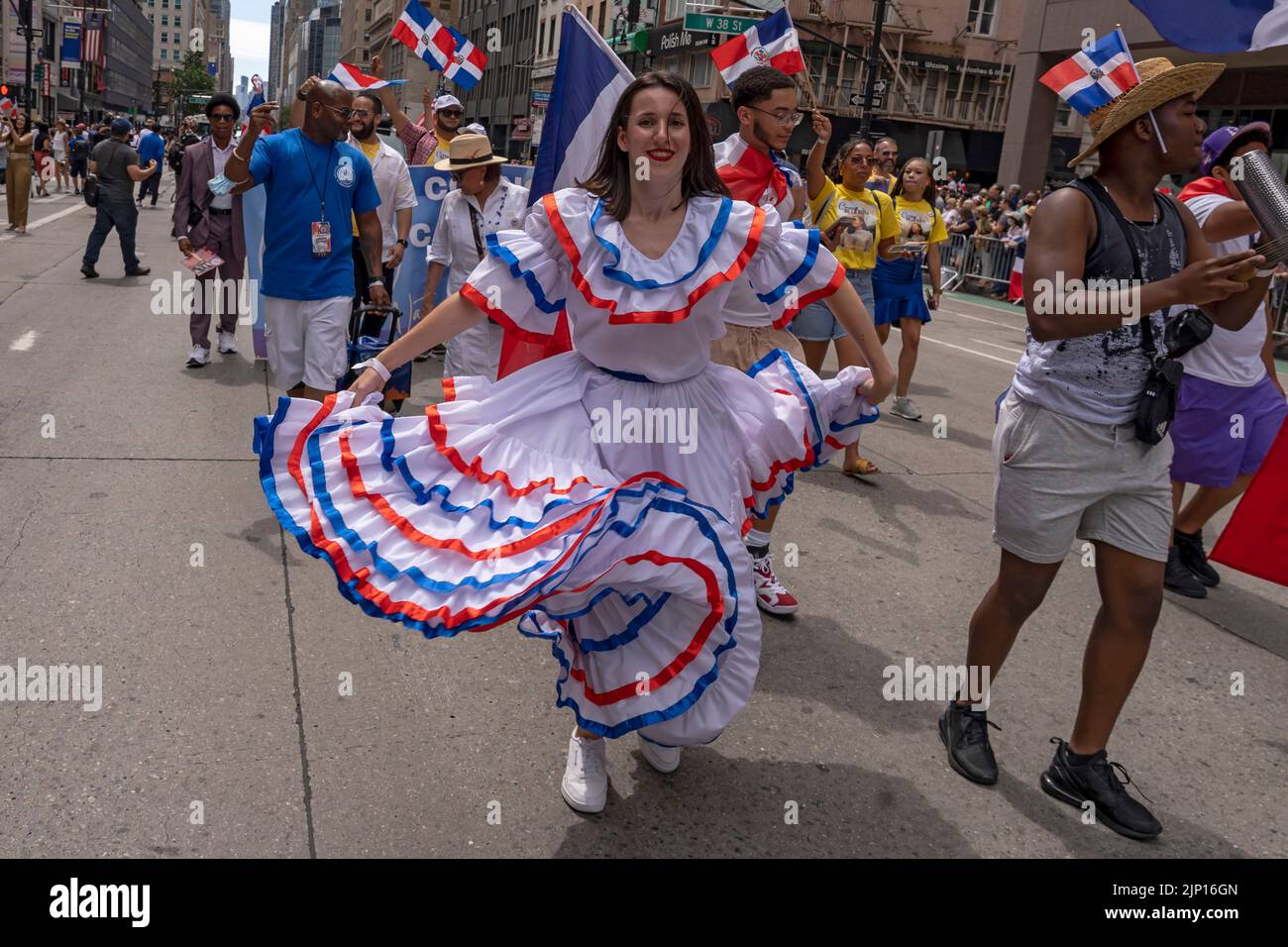 NEW YORK, NEW YORK – AUGUST 14: Participants dance and march at the ...