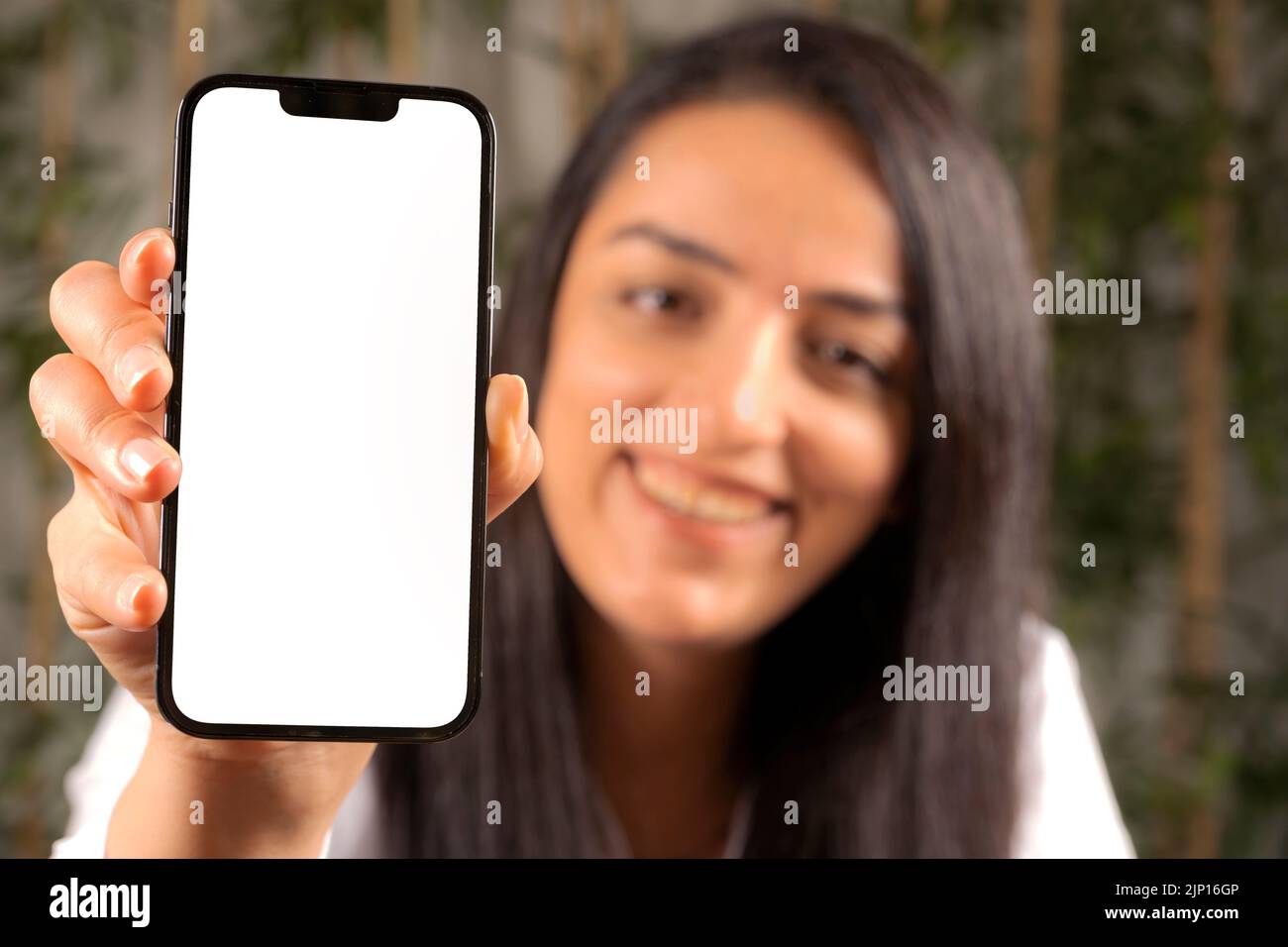 Smartphone mock up, young woman holding smartphone mock up. Caucasian ...