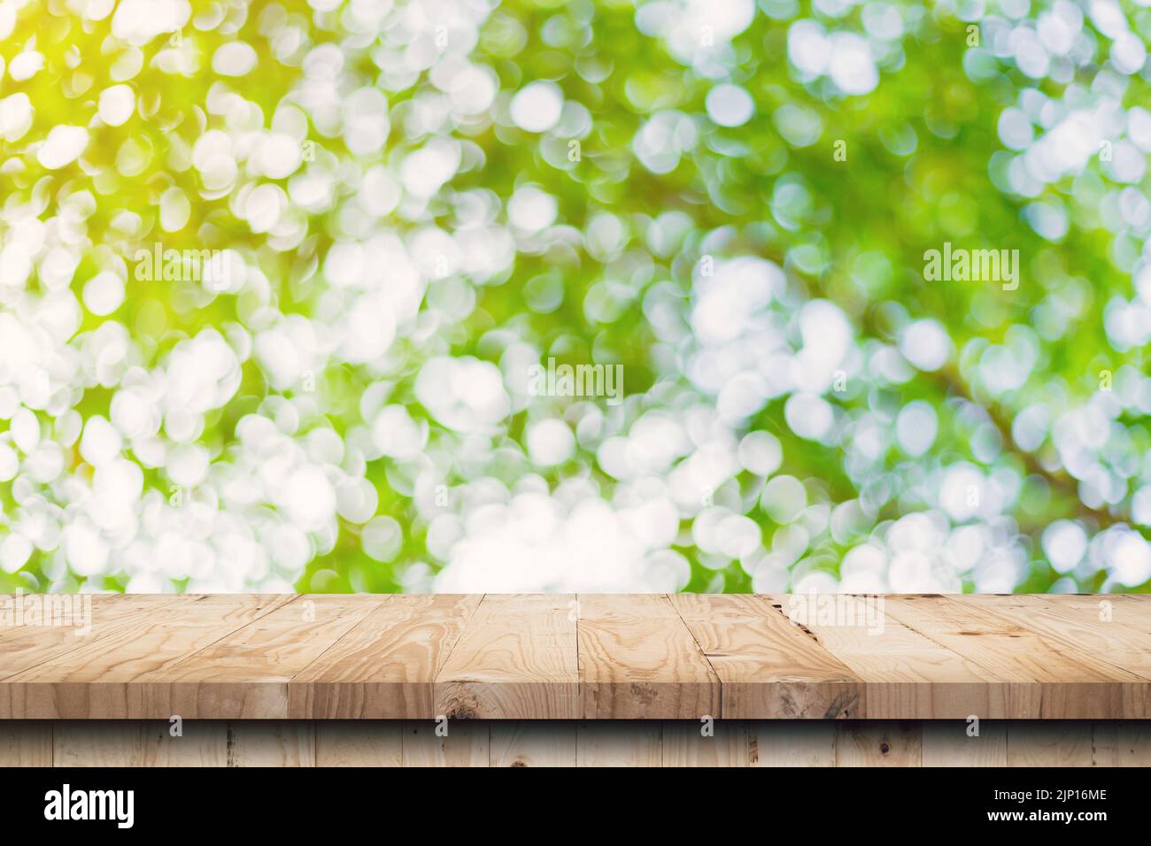 green leaf bokeh blurred and wood table for nature background Stock ...
