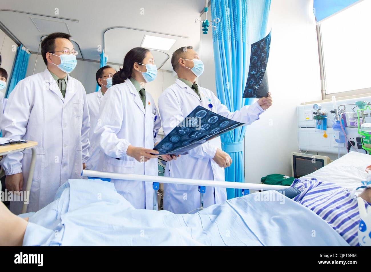 NANJING, CHINA - AUGSUT 15, 2022 - Medical staff check the health of ...