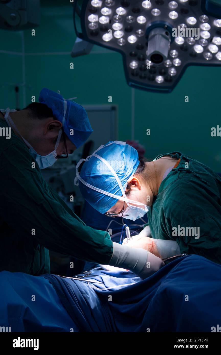 NANJING, CHINA - AUGSUT 15, 2022 - Medical staff perform an operation ...