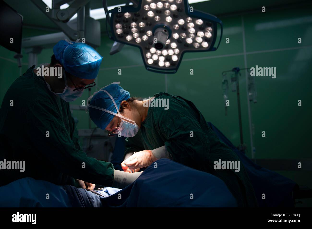NANJING, CHINA - AUGSUT 15, 2022 - Medical staff perform an operation ...
