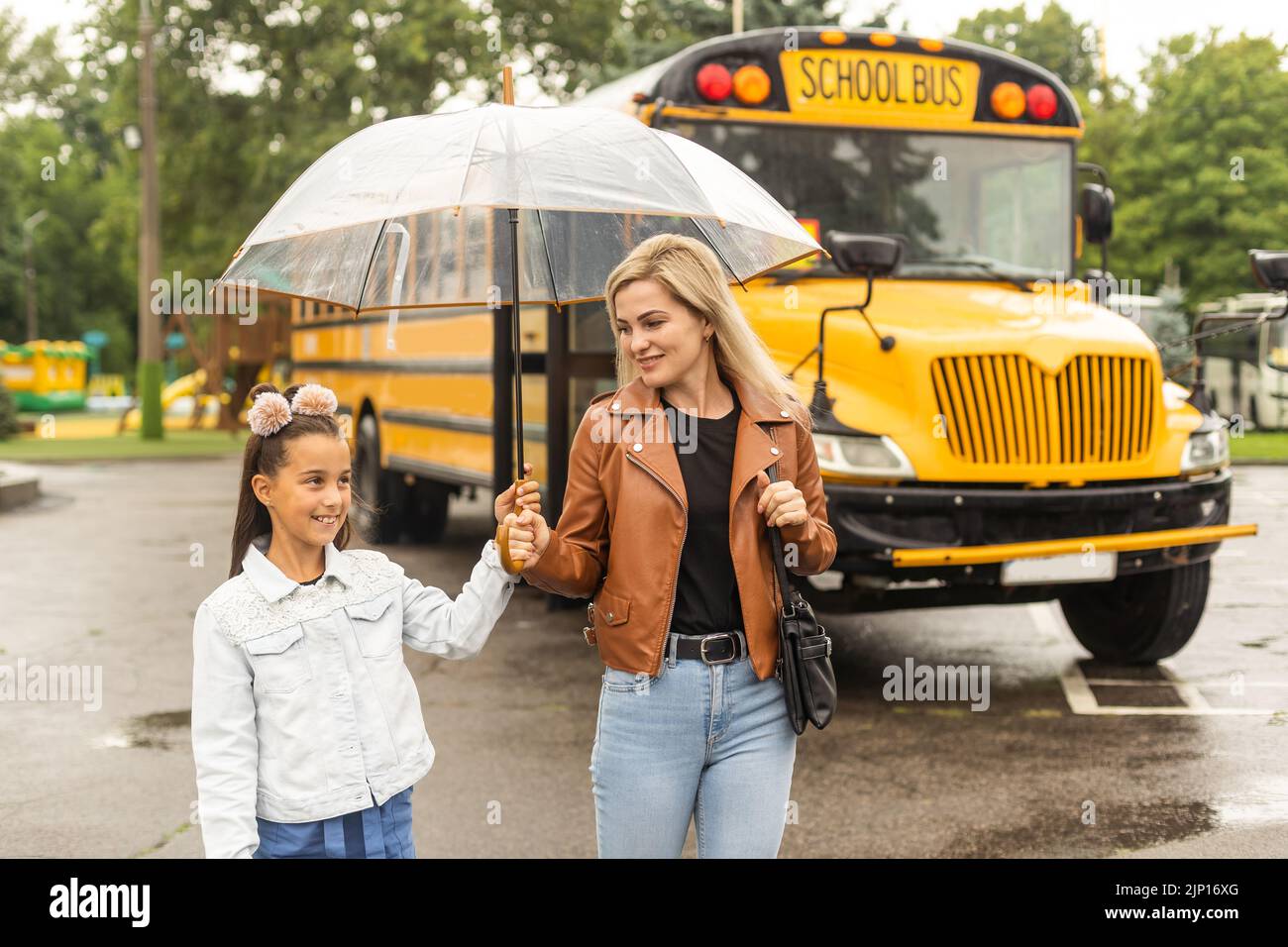 Teen boy and girl school bus hi-res stock photography and images - Alamy