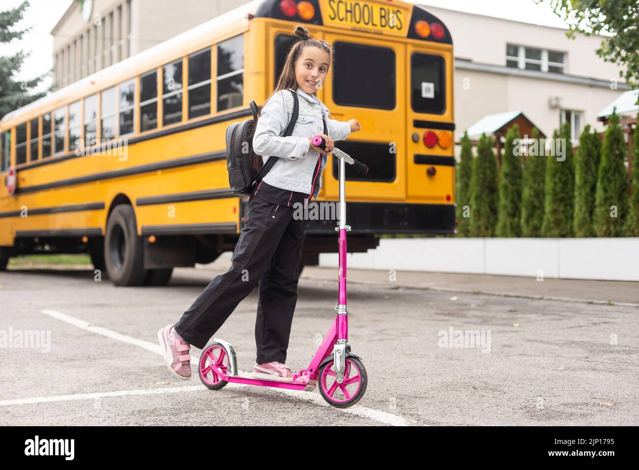 First day of school. Happy child girl elementary school student runs to ...
