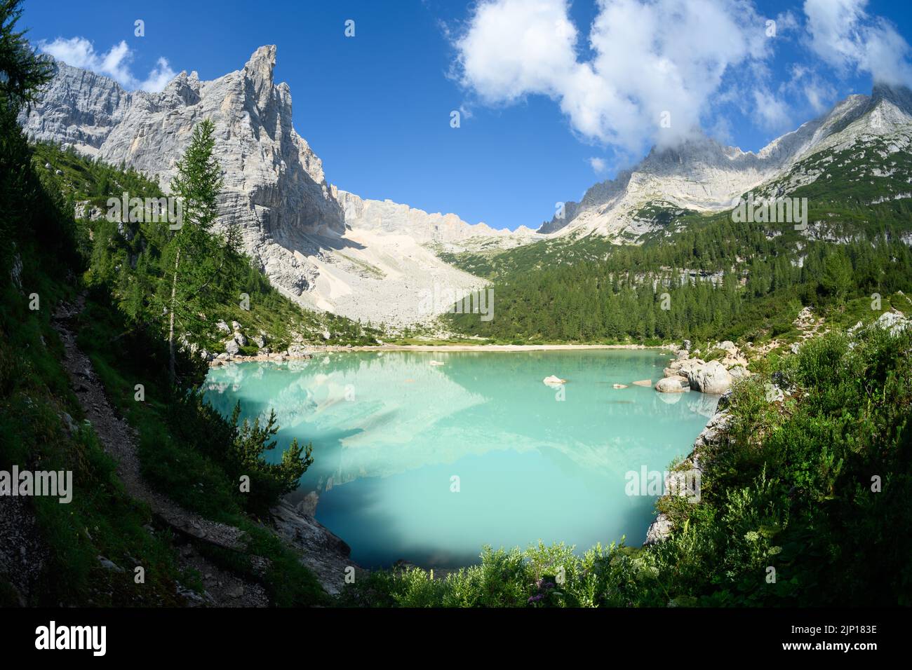 Stunning view of Lake Sorapis with its turquoise waters surrounded by ...
