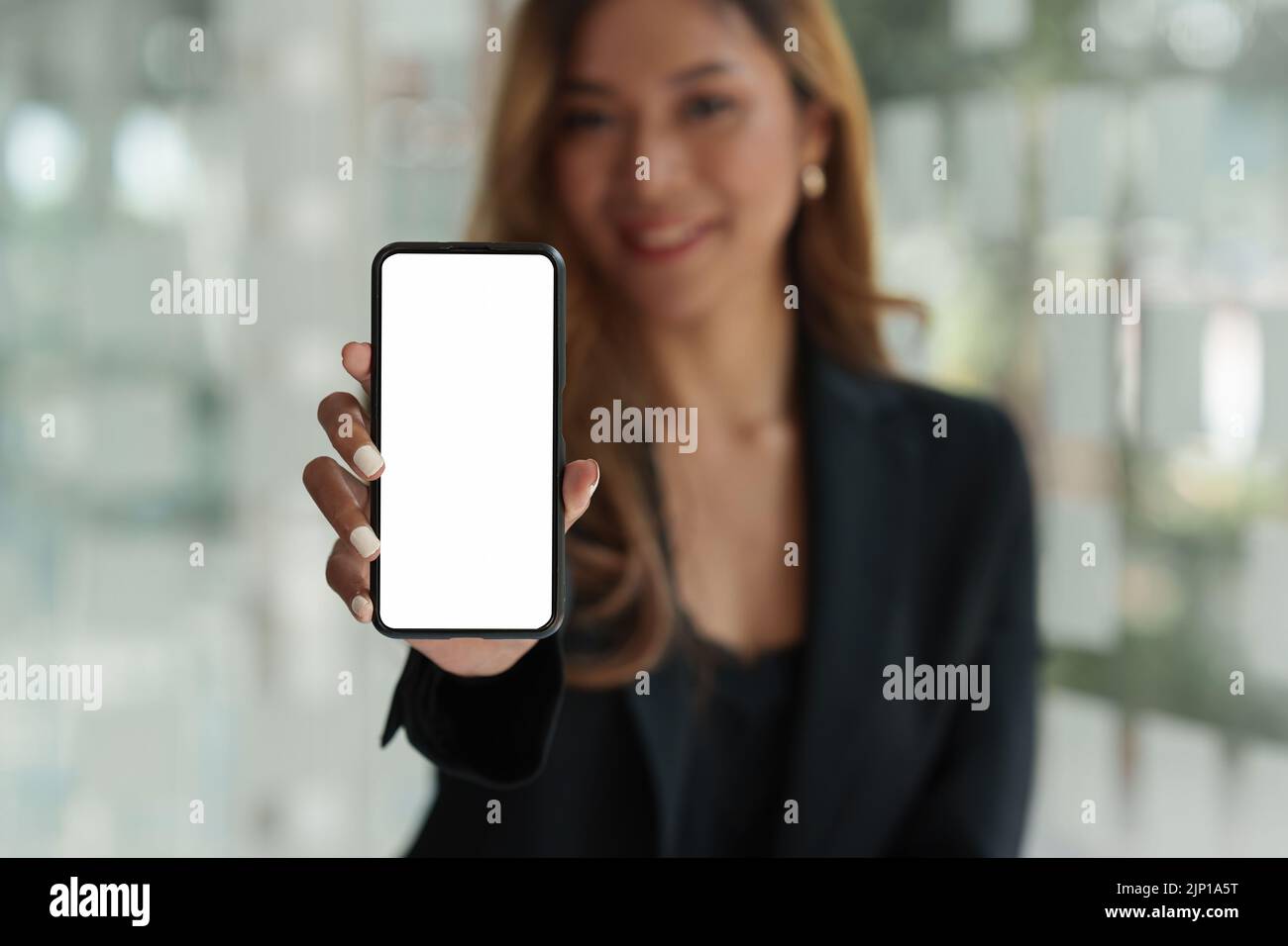 A Woman excited surprise and showing cell phone screen. Blank screen ...