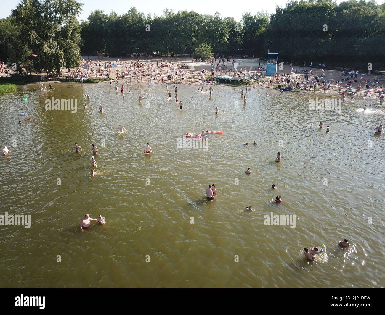 Moscow. Natural and historical Kosinsky park. People swim in Lake ...