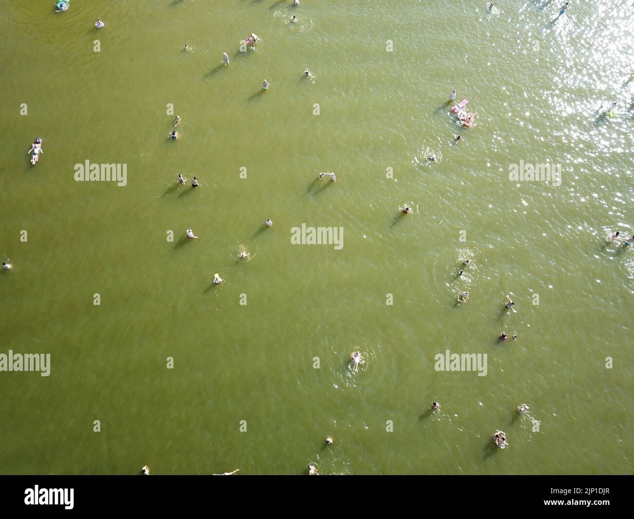 Moscow. Natural and historical Kosinsky park. People swim in Lake ...