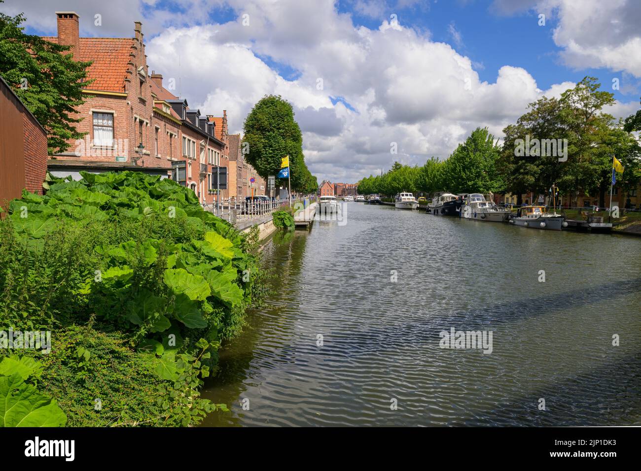 Brugge, Belgium - July 4, 2022: Old canal with trees and houses in ...