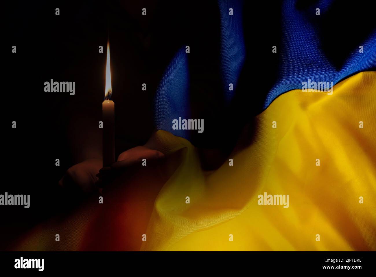 The national flag of Ukraine is yellow and blue against the background ...