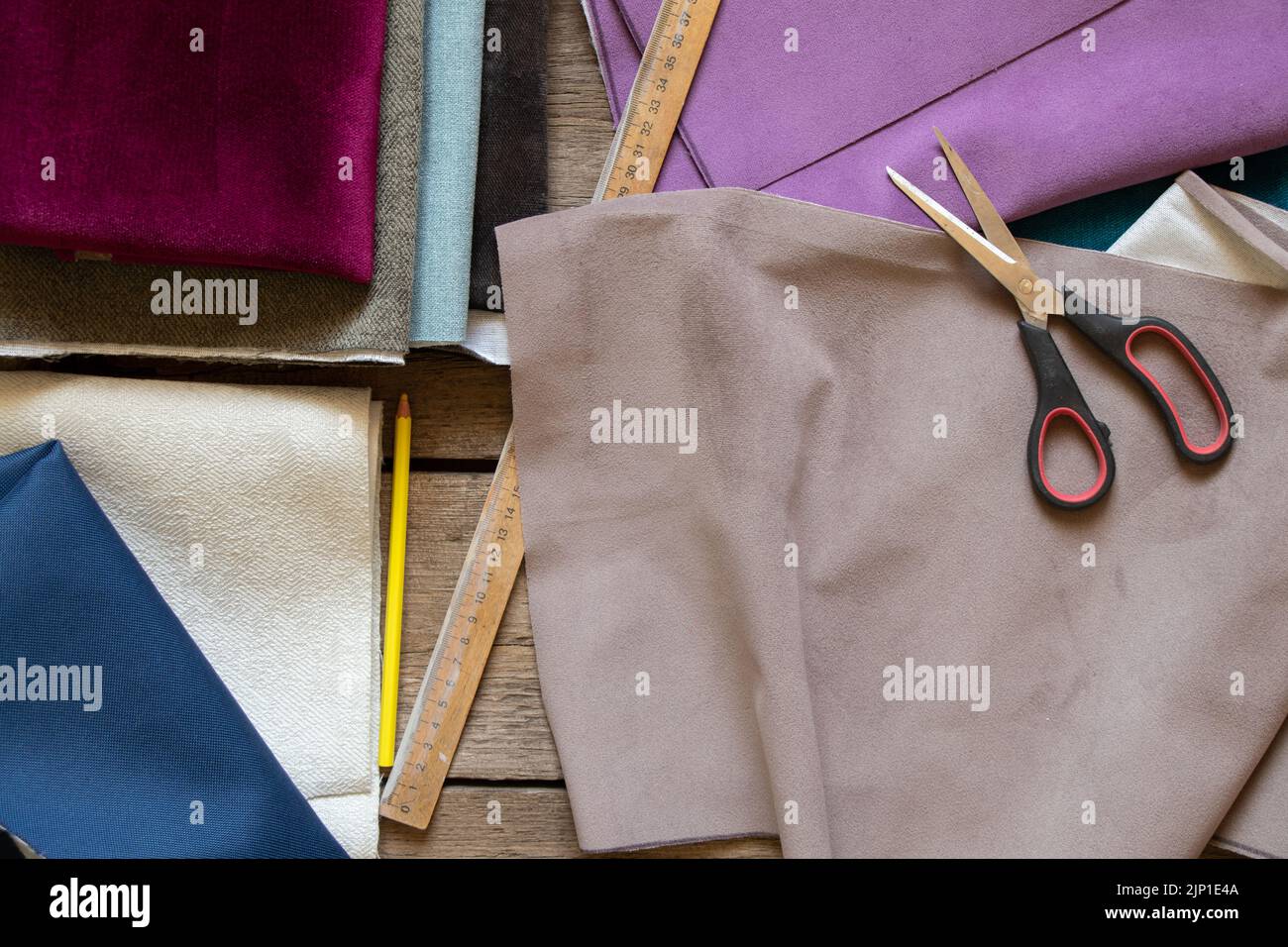 Patterns on the table different pieces of fabric, tailor workshop ...