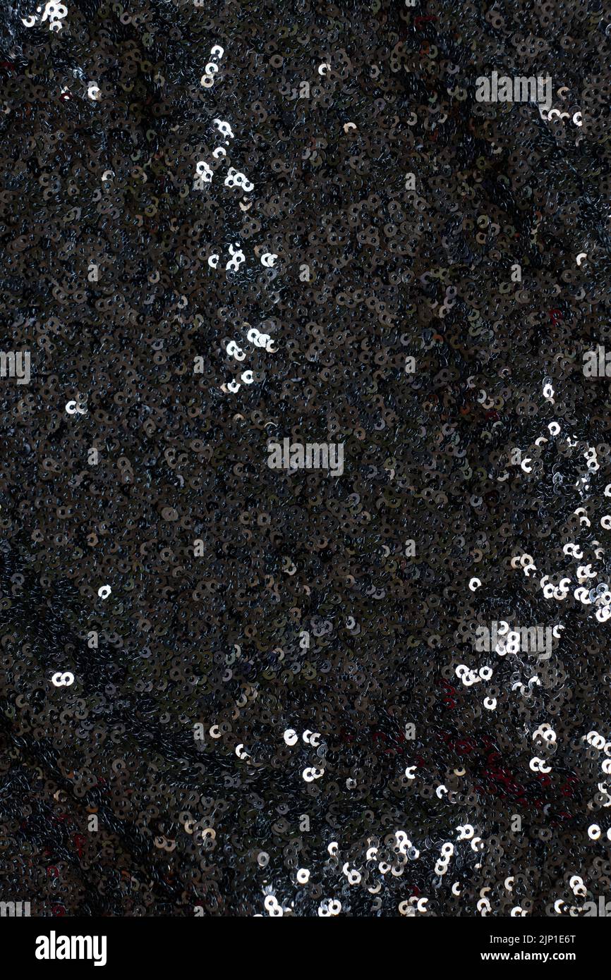 black wrinkled fabric with sequins as background fabric with sequins ...