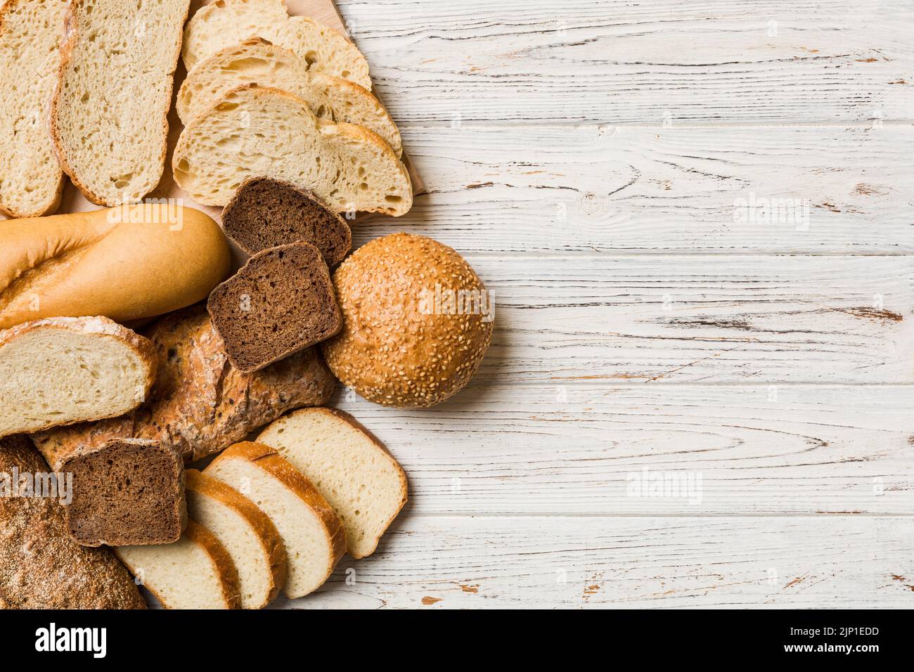 Homemade natural breads. Different kinds of fresh bread as background ...