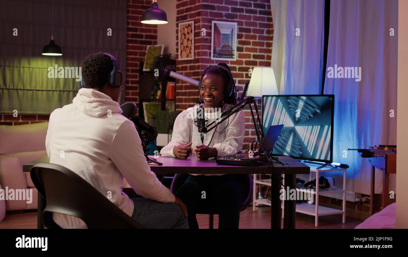 African american online radio host talking in interview with influencer ...