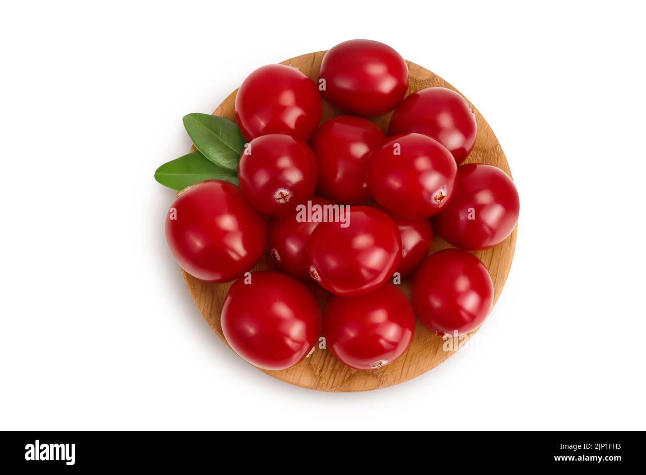 Cranberry in wooden bowl isolated on white background with full depth ...