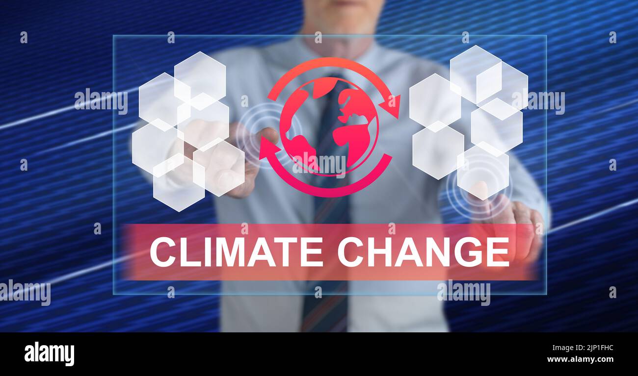 Man touching a climate change concept on a touch screen with his ...