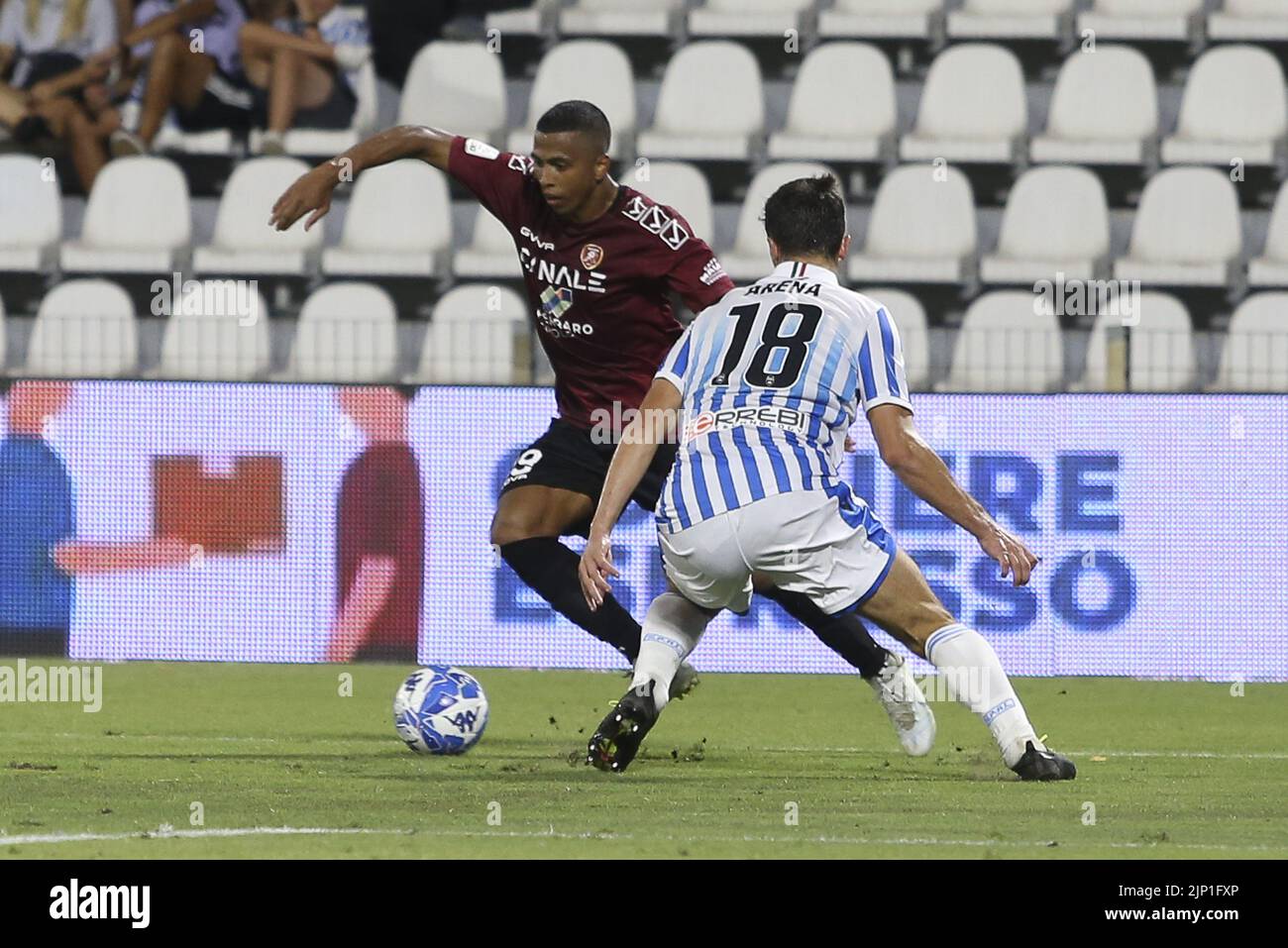 Rigoberto Rivas of Reggina competes for the ball with Matteo Arena of ...