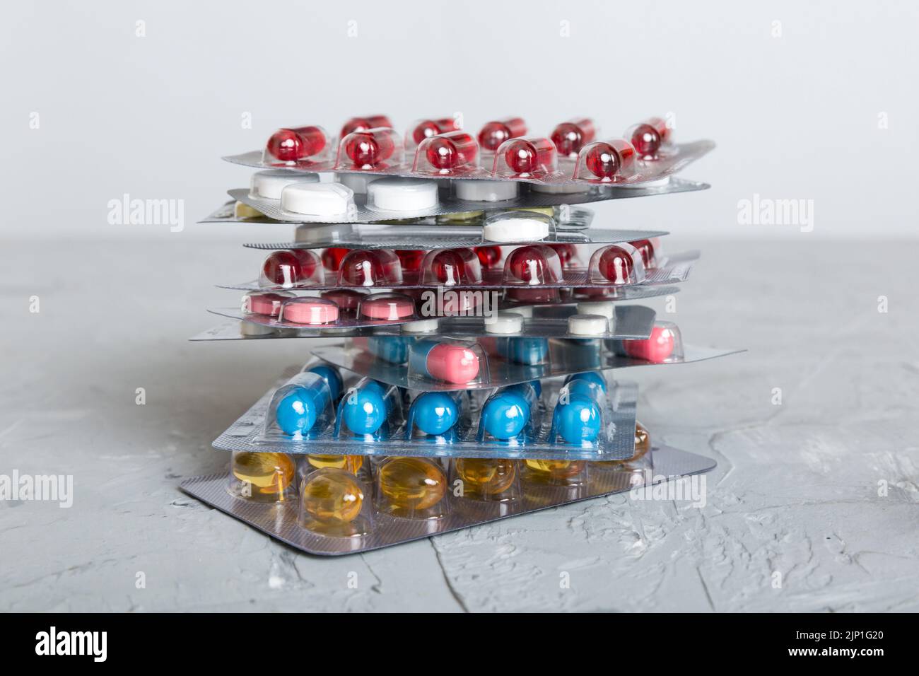 too many different pill cartridges stacked. selective Focus. Packs of ...