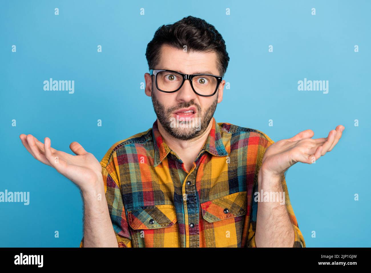 Photo of unknown brunet guy wear spectacles checkered shirt isolated on ...