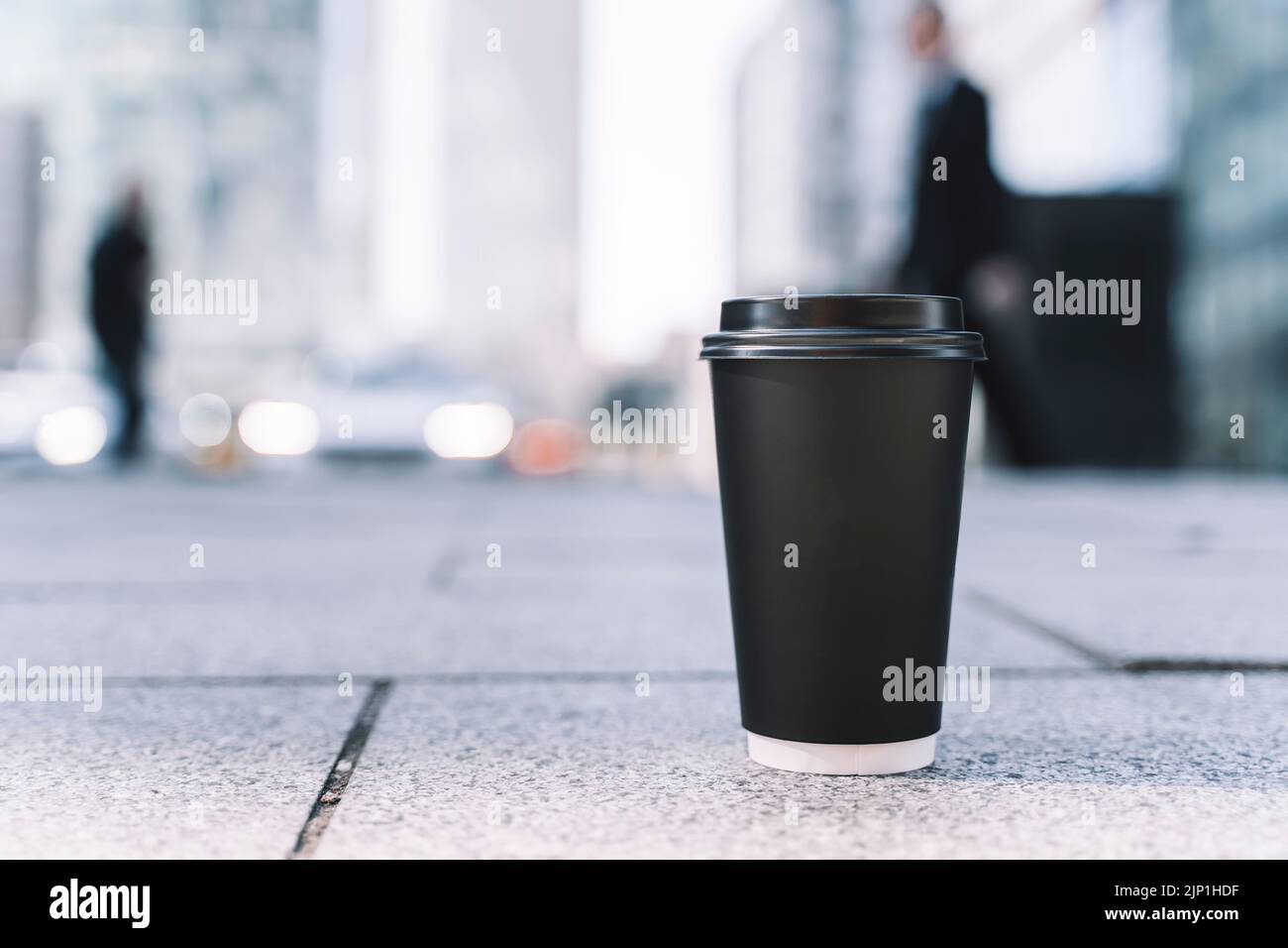 Takeaway coffee in a paper cup. Hot drink to go on the background of a ...