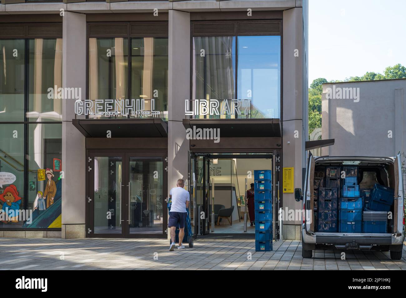 Man with a van making a delivery to the Greenhill Library, a public ...