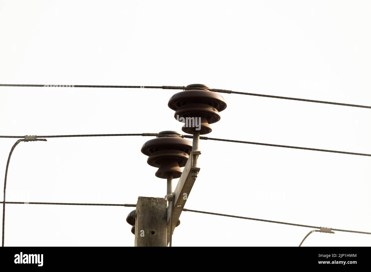 Overhead Electricity Lines with Insulators Stock Photo - Alamy