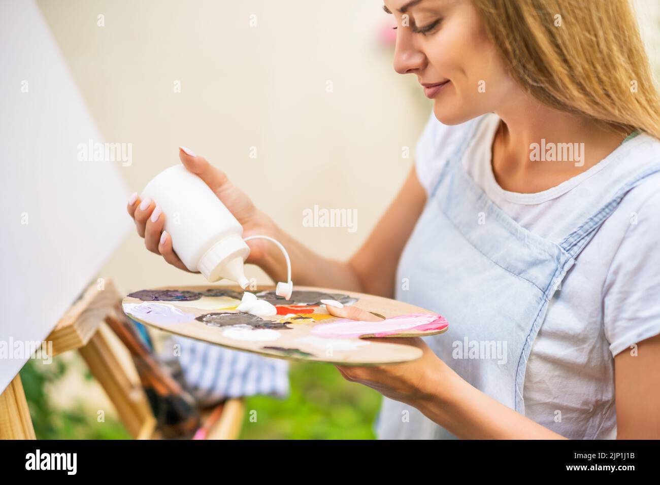 Woman enjoys painting on hi-res stock photography and images - Alamy