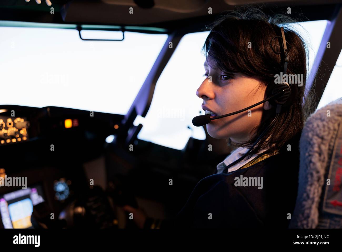 Aircrew copilot using power radar on dashboard to fly aircraft jet ...