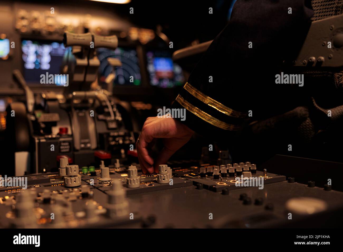 Female copilot switching control panel buttons on dashboard command ...