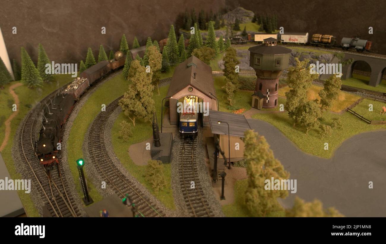 Top view of train models on the railway. Model trains with steam moving ...
