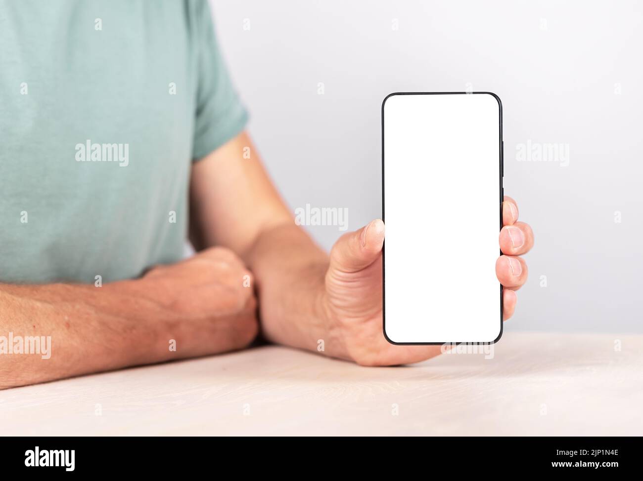 Man holding phone mockup in vertical position. Android with empty ...