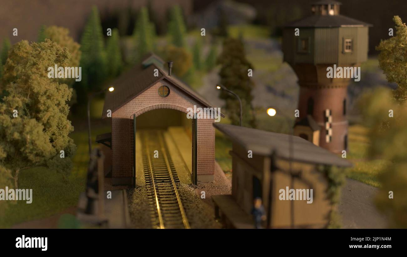 Depot station on the model of the railway road. Model train station at ...