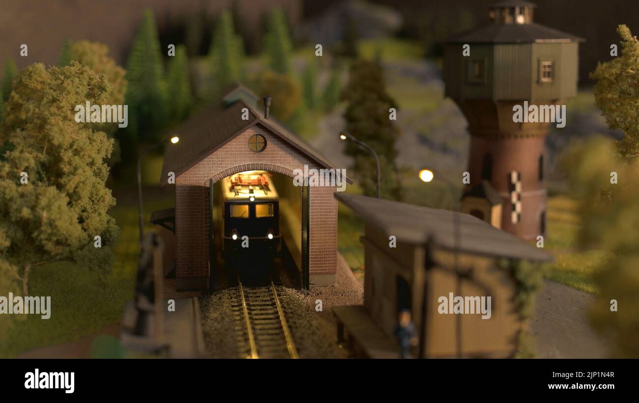 Model of electric locomotive at train station. Model train station at ...