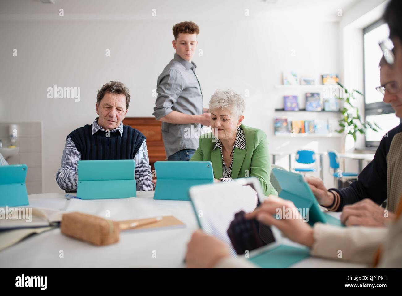 Student attending class with tablet hi-res stock photography and images ...