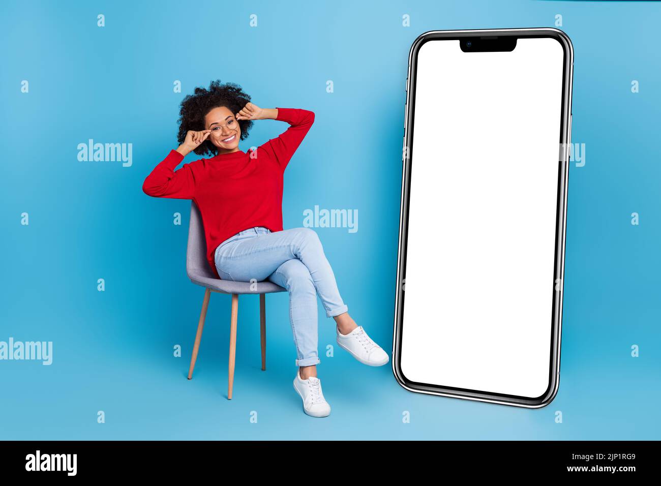 vPhoto of dreamy cute lady dressed red pullover sitting chair modern ...