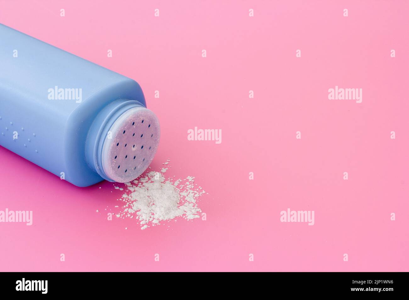 Skin care with talcum powder in container. Spilled white powder Stock ...