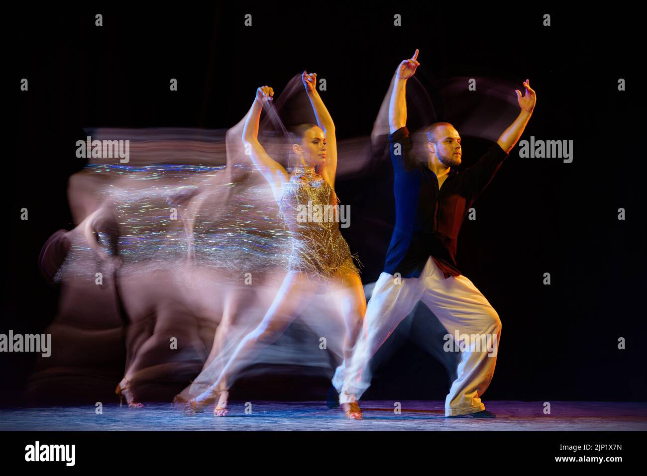 Freedom. Two professional dancers dancing ballroom dance isolated on ...