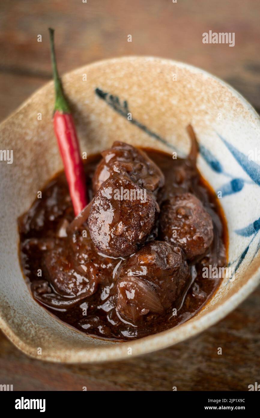 spicy chilli chorizo sausage in red wine escabeche sauce tapas Stock ...