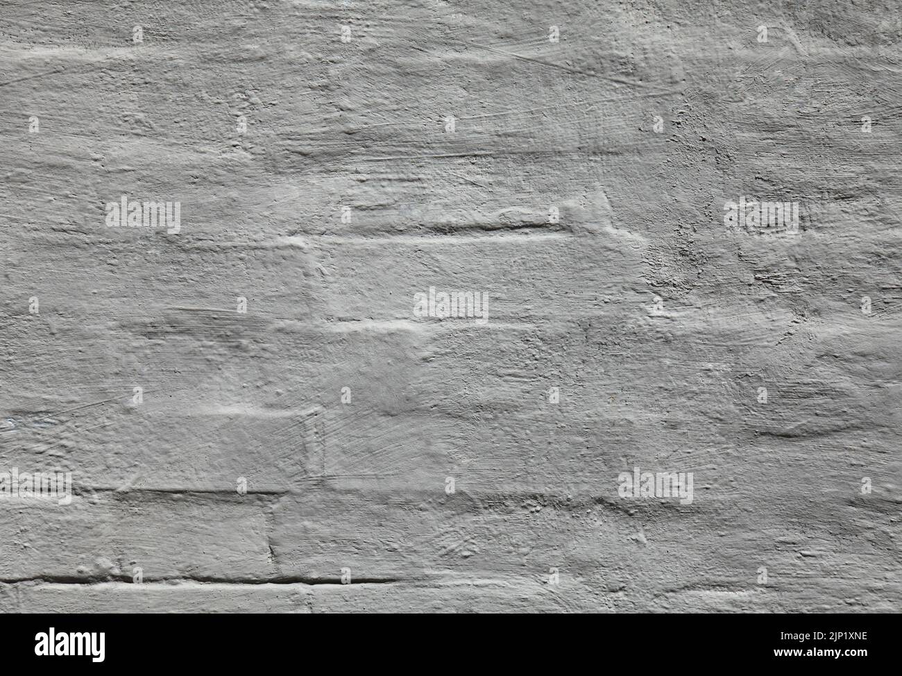 Grey wall, texture, background. The building wall, painted with whiting. Wavy and bumpy surface ...
